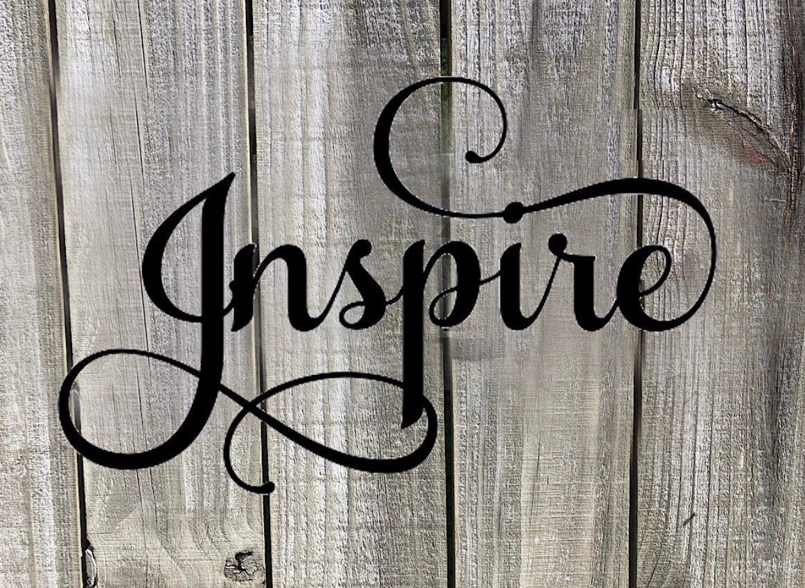 The Word Inspire In Cursive
